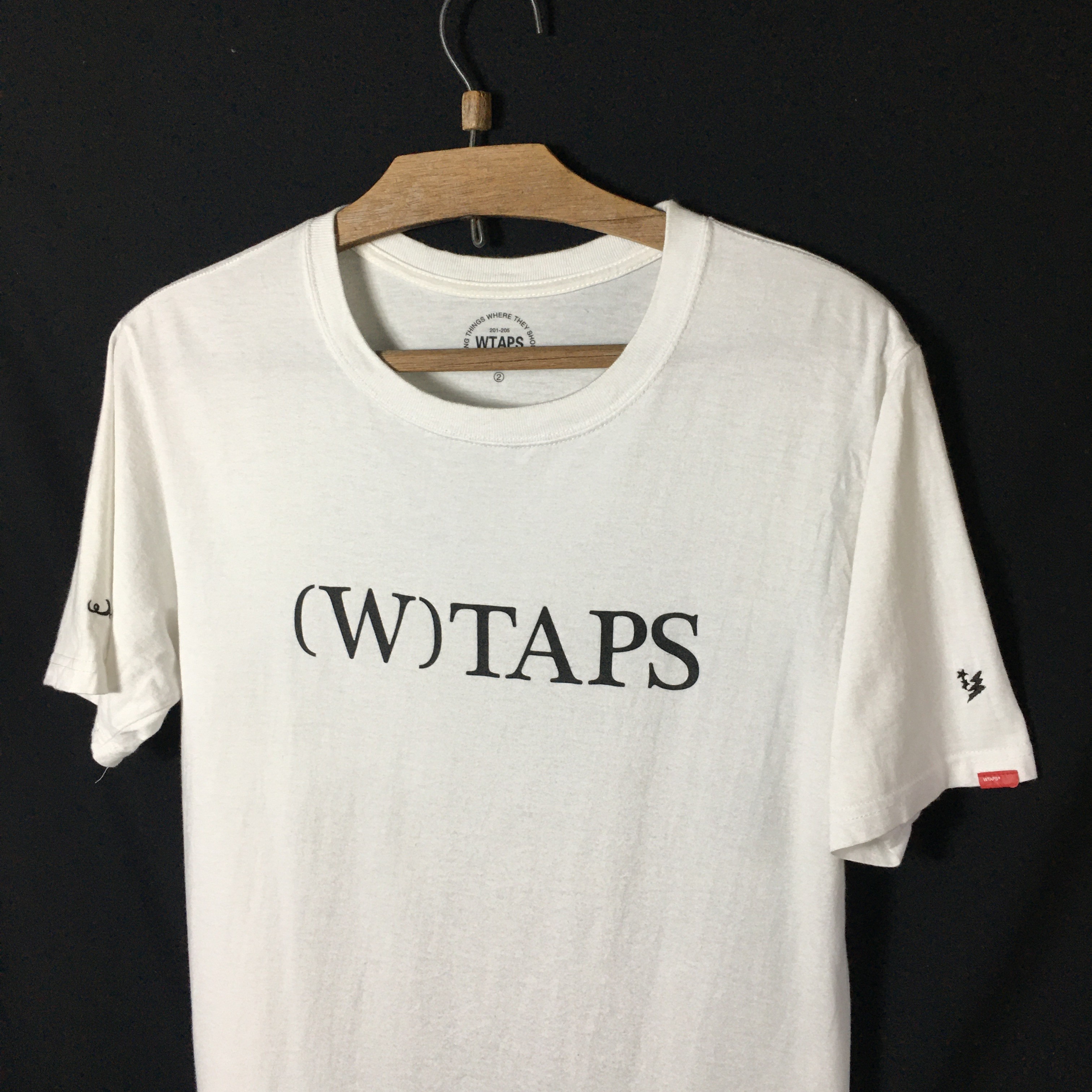 WTAPS Wtaps Visual Uparmored White Script Spellout Tee | atuki | REVERSIBLE