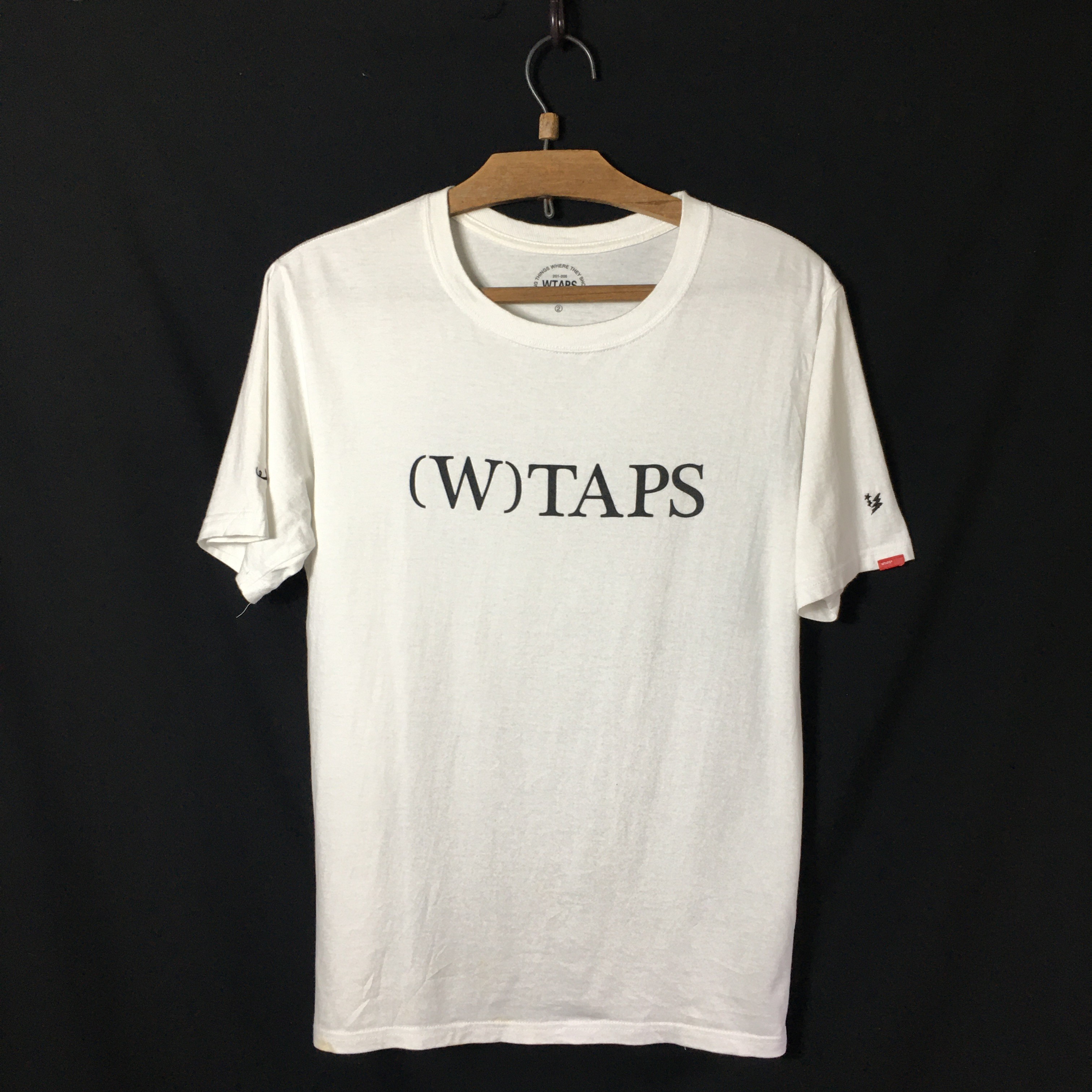 WTAPS Wtaps Visual Uparmored White Script Spellout Tee | atuki | REVERSIBLE